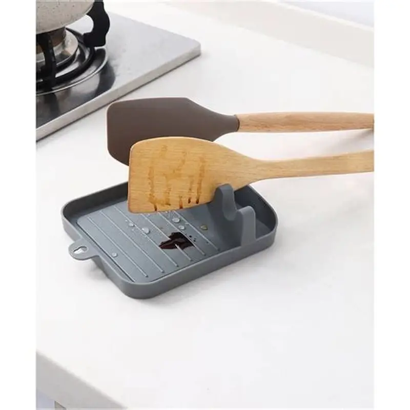 Plastic Oil Spill Spoon Resting — Street10